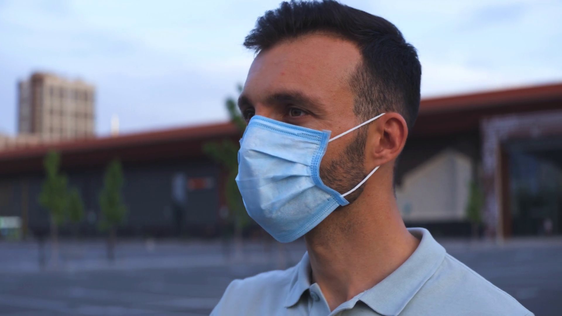 The Handsome Man Takes Off Mask Outdoor Stock Footage SBV-338678300 ...