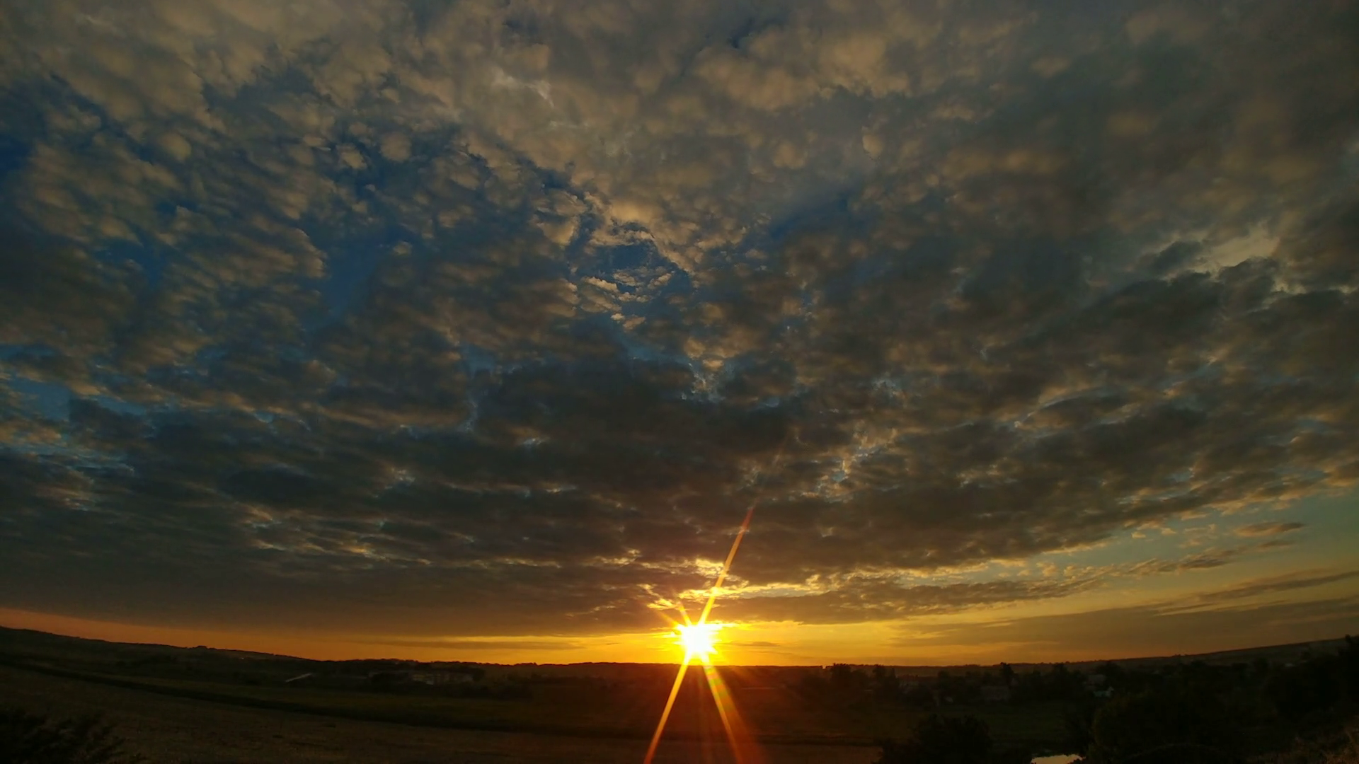 The cloud stream on the picturesque sunset background, time lapse Stock ...