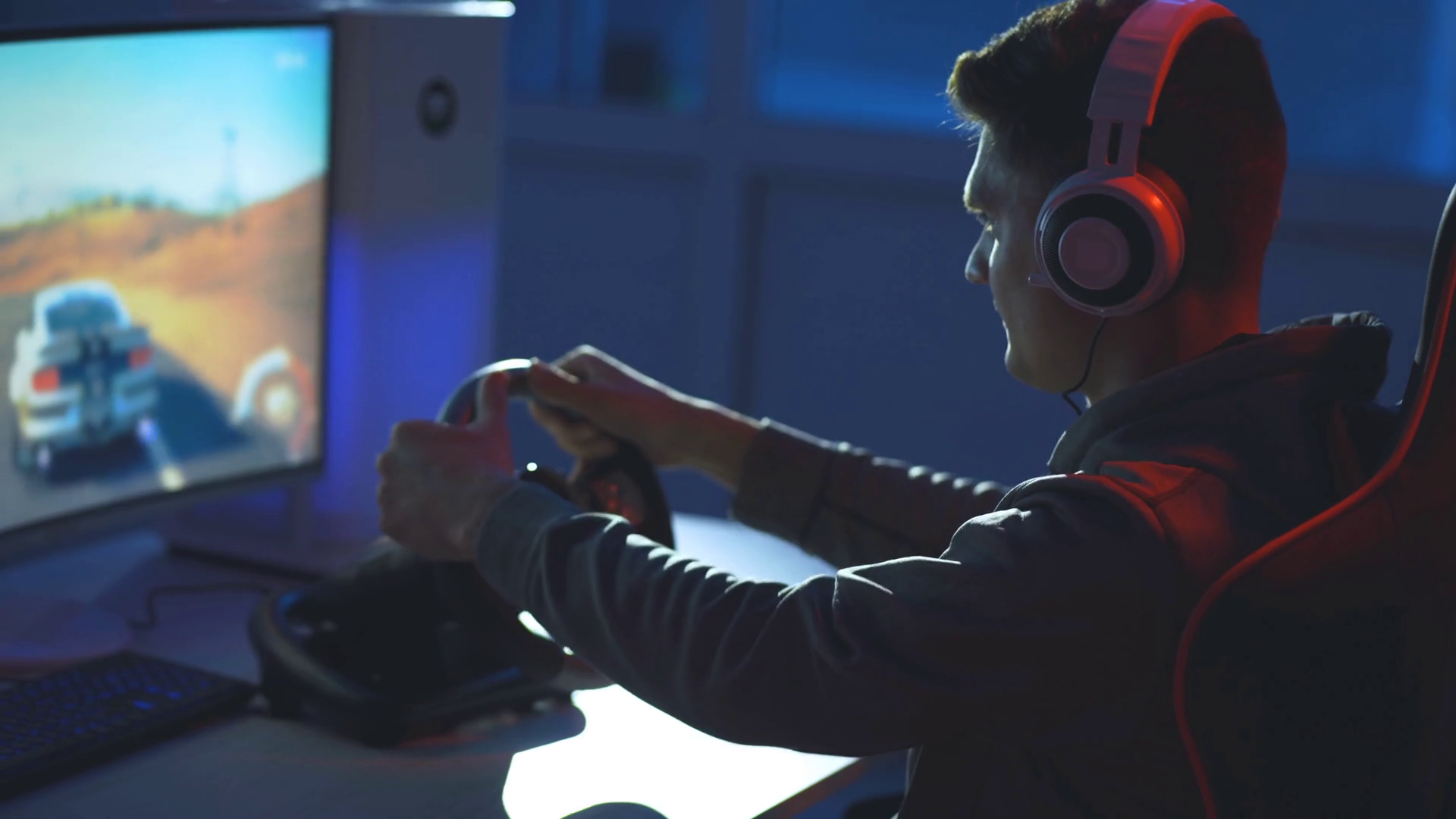 The Gamer With Headphones Holding Steering Stock Footage SBV-338522849 ...