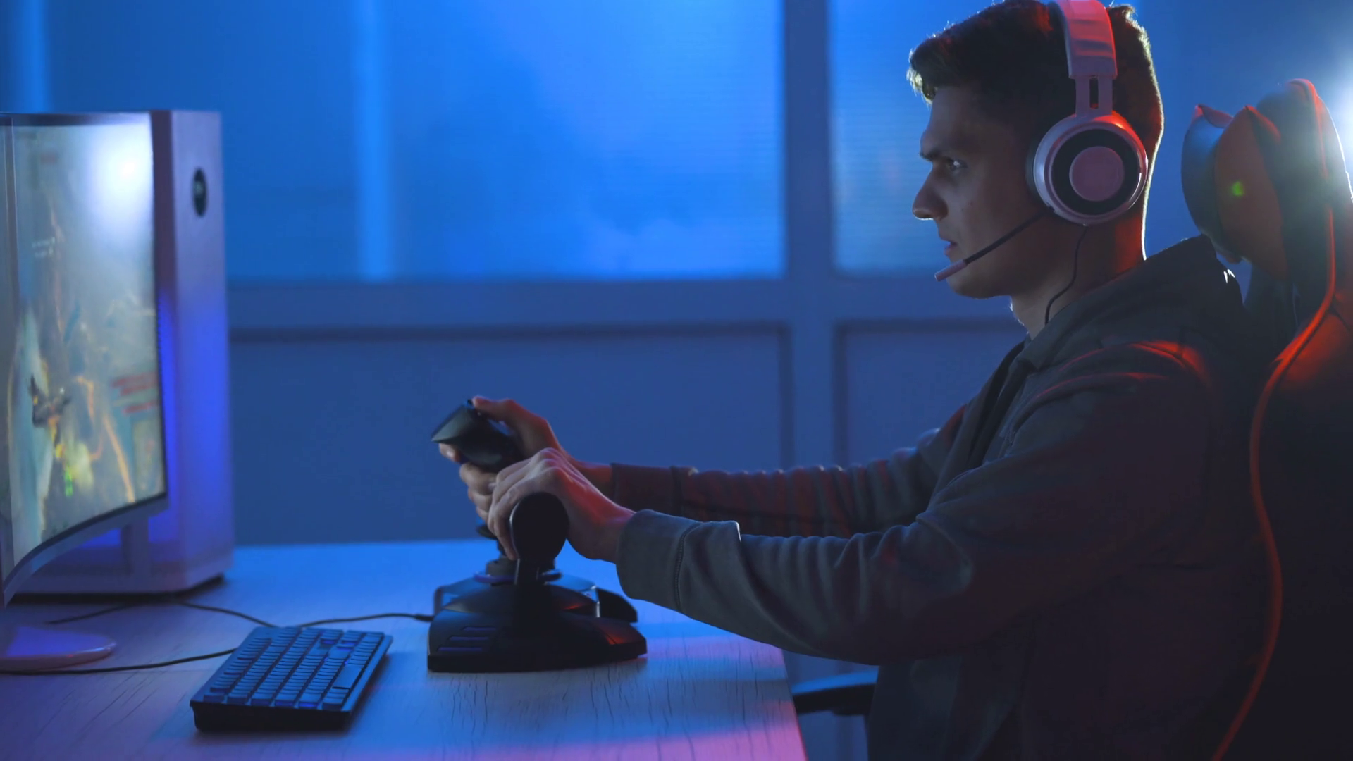 The Guy Gamer With Headphones Playing Video Stock Footage SBV-338282285 ...