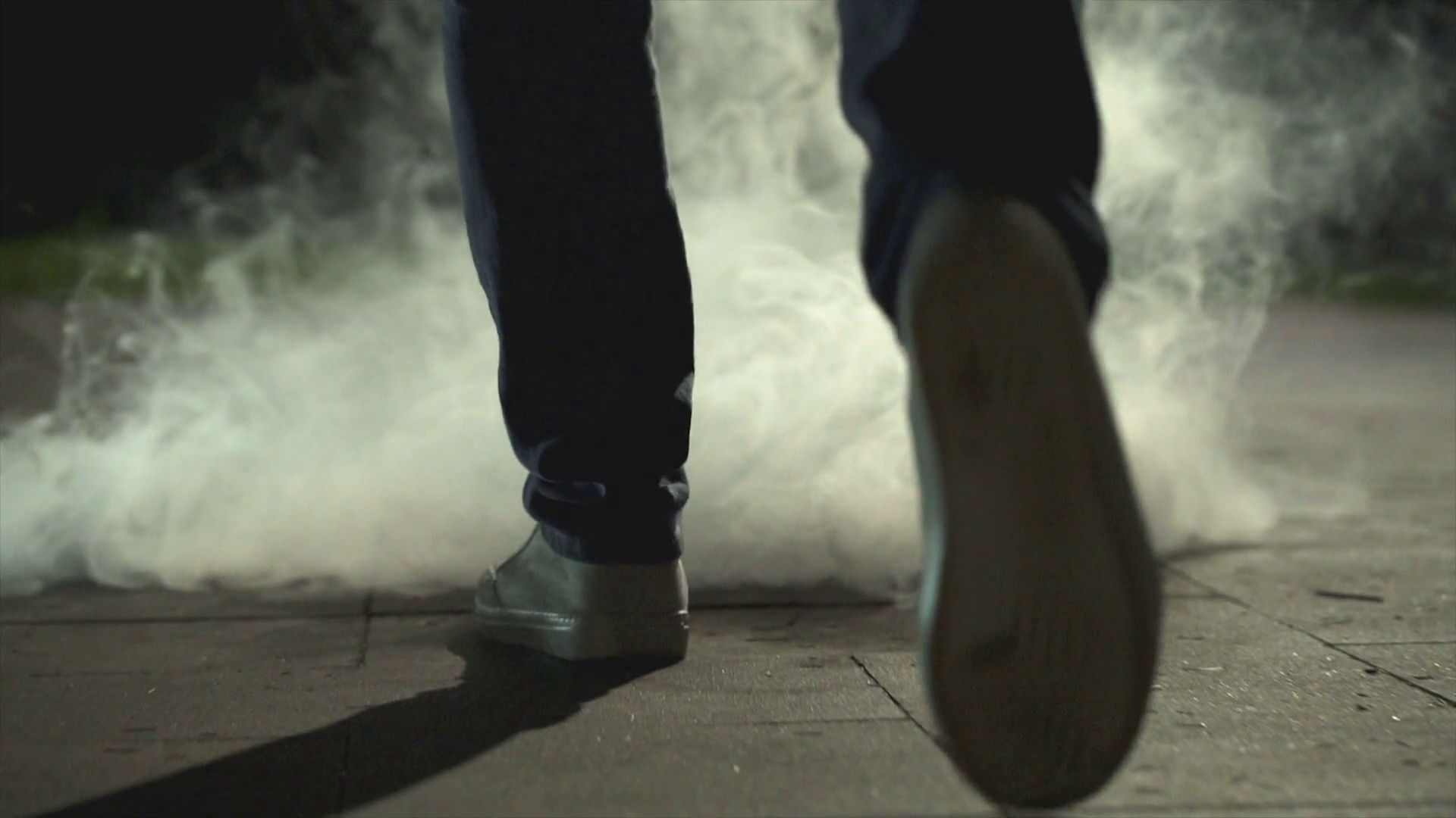 The Legs Of Man Walking Near Cloud Of Smoke Stock Footage SBV-326611025 ...