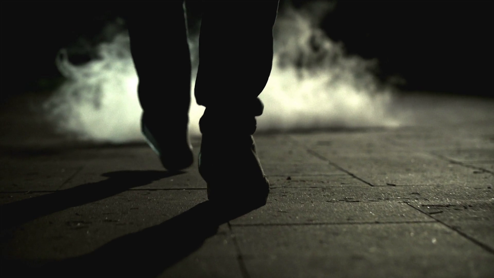 The Legs Of Man Walking Near Cloud Of Smoke Stock Footage SBV-326611001 ...