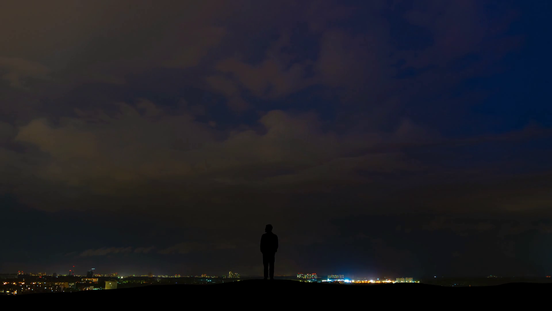 The man standing above the city with a lightning. time lapse Stock ...