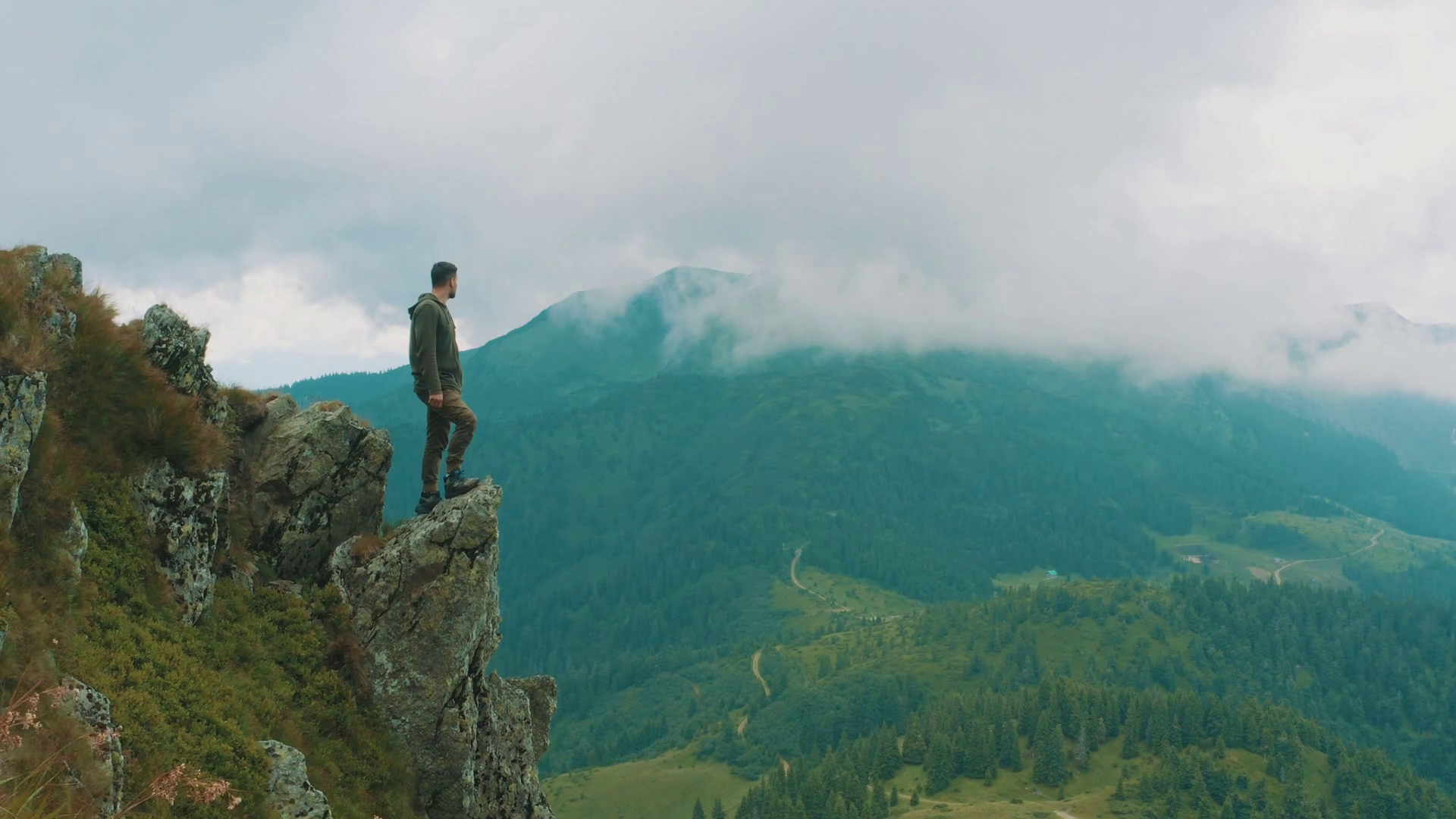 The Man Standing On Cliff Of Rock Stock Footage SBV-337741100 - Storyblocks