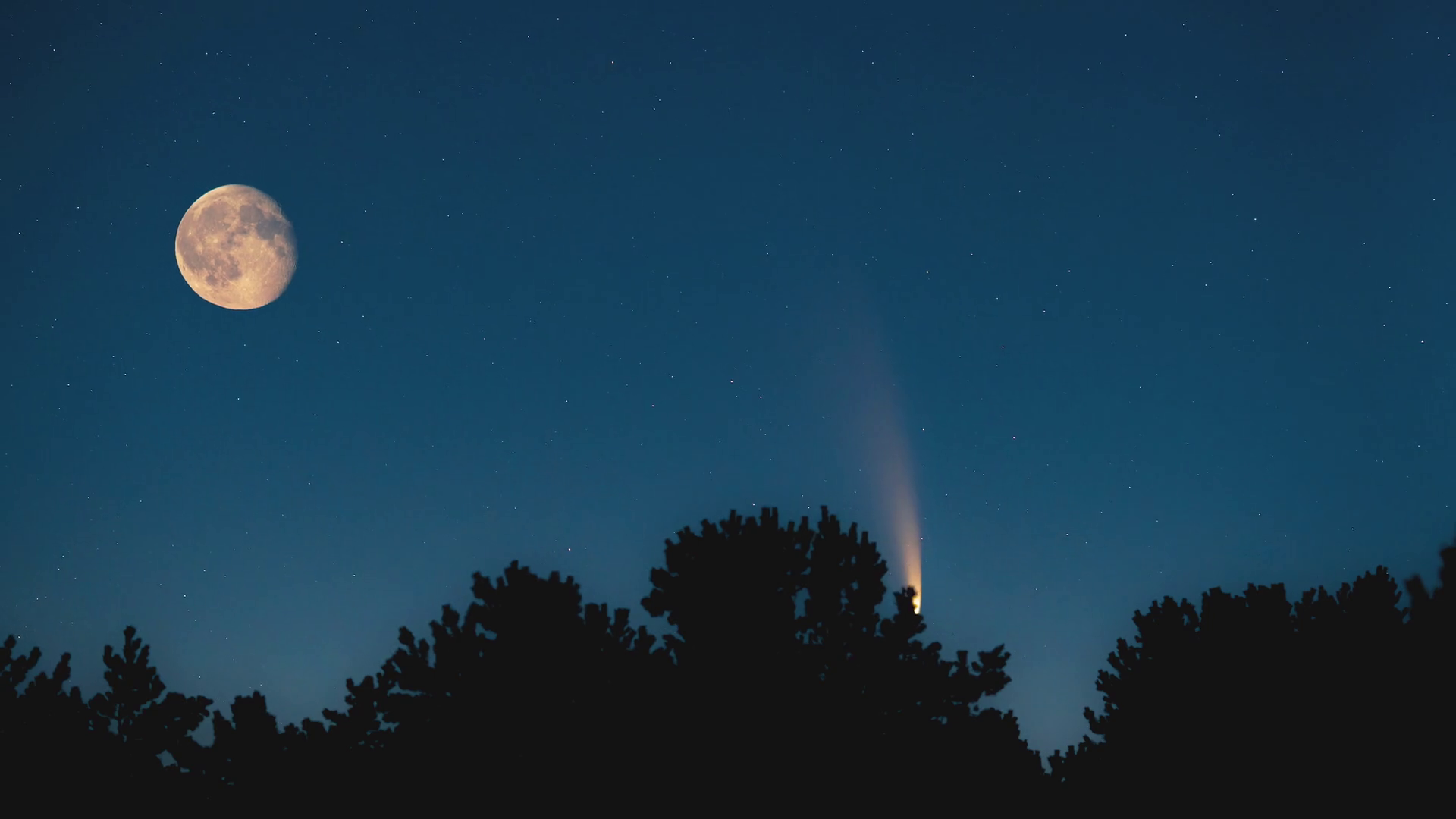 The moon and flighting comet on the evening starry sky background. time ...