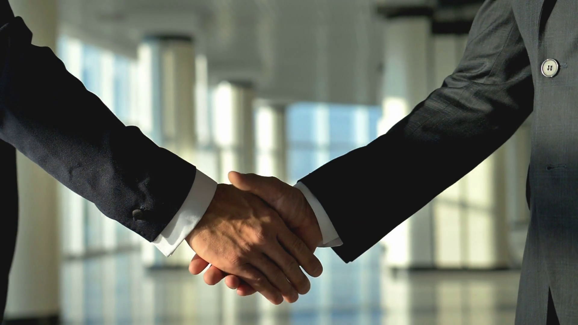 The two businessmen handshake in the office. slow motion Stock Video ...