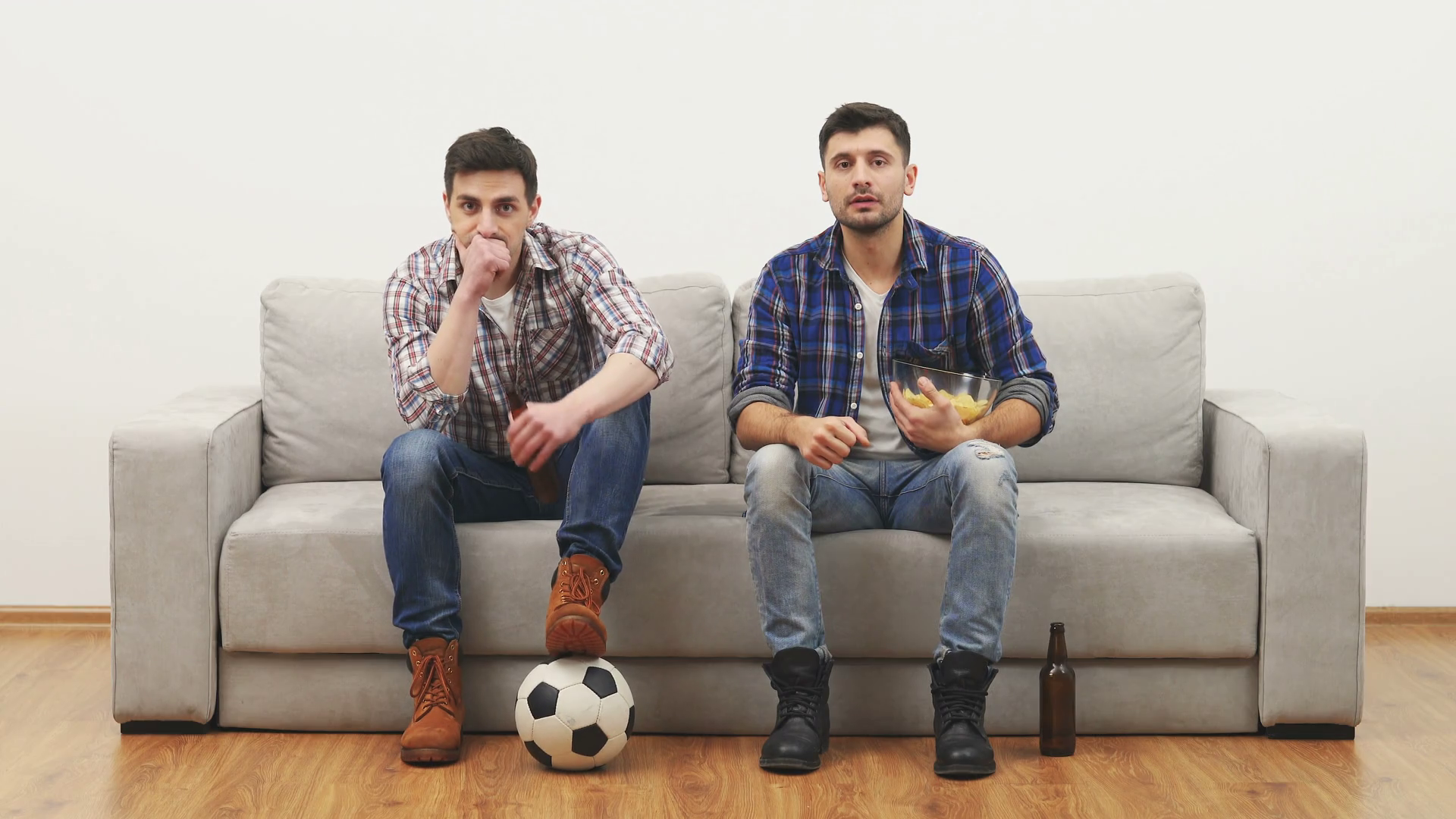 The Two Men Celebrating Goal On Sofa Stock Footage SBV-323722125 ...