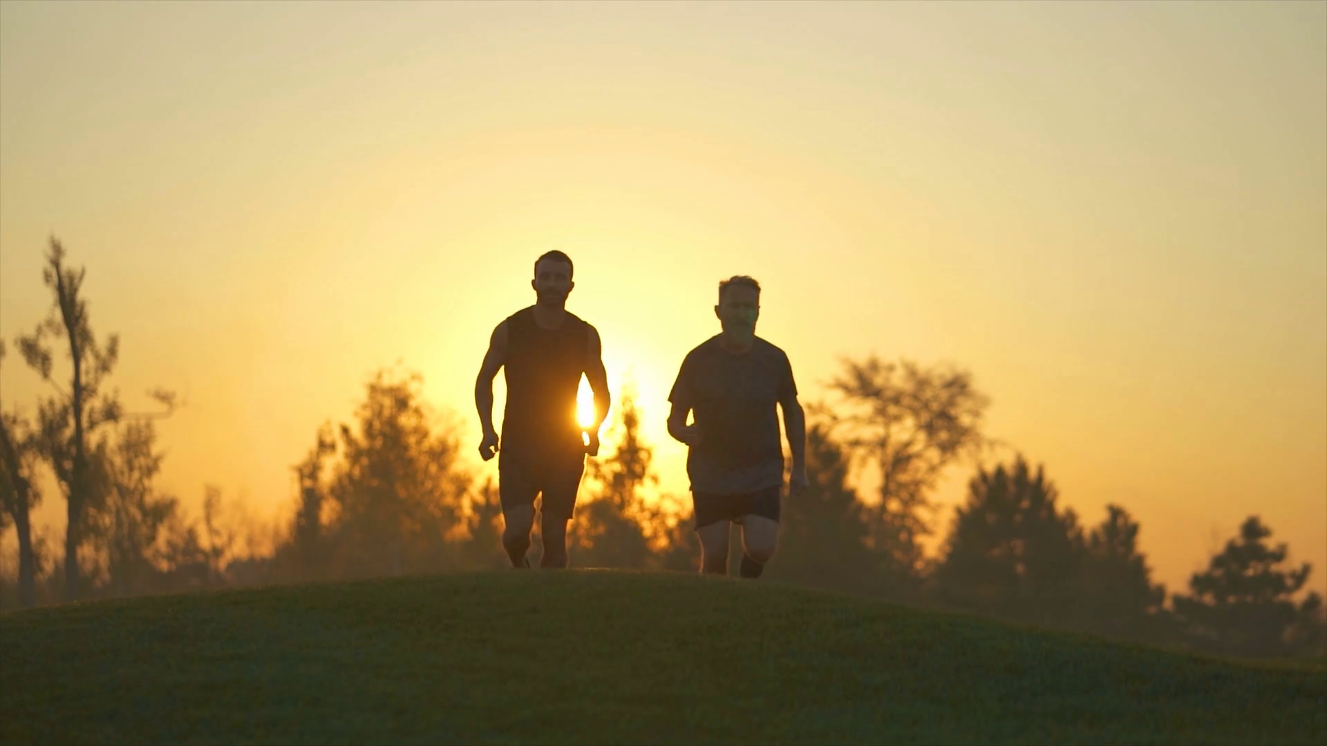 Two Individuals Jogging On Lawn During Stock Footage SBV-328684033 ...