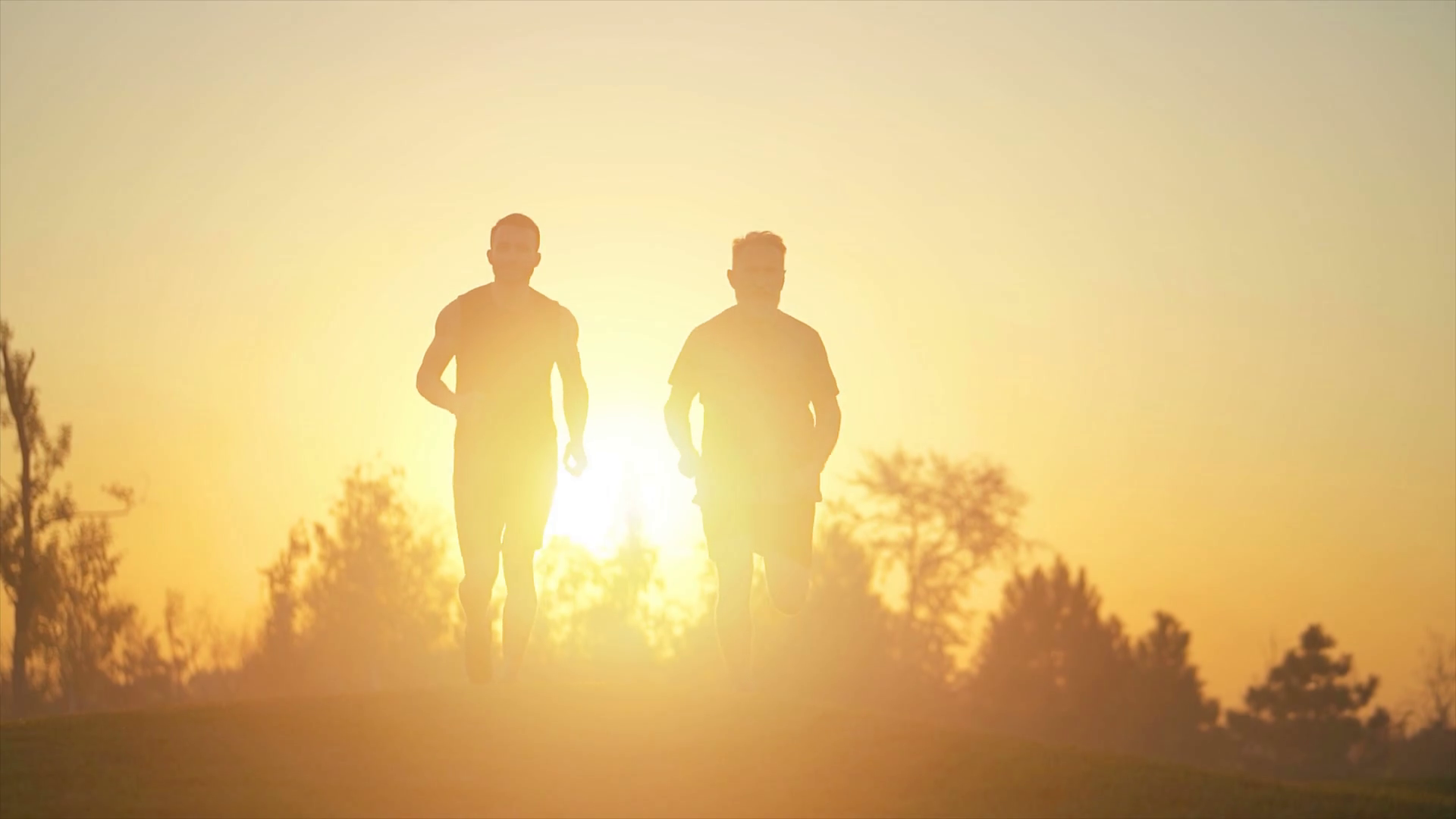 The Two Men Running On Grass On Bright Stock Footage SBV-328684045 ...