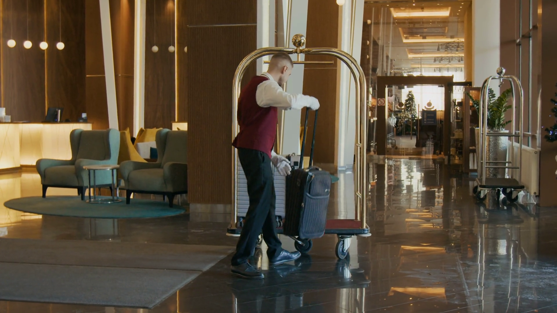 Bellhop In Formal Uniform Greeting Female Stock Footage SBV-352029375 ...