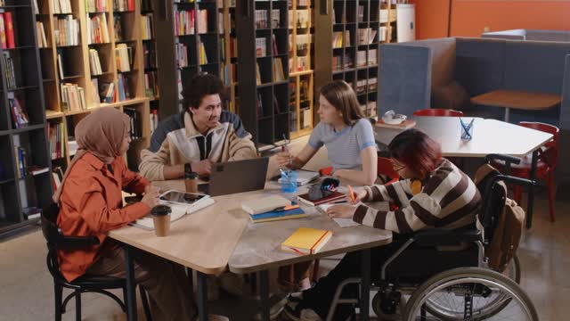 Librarian Helping Students Stock Footage: Royalty-Free Video Clips ...