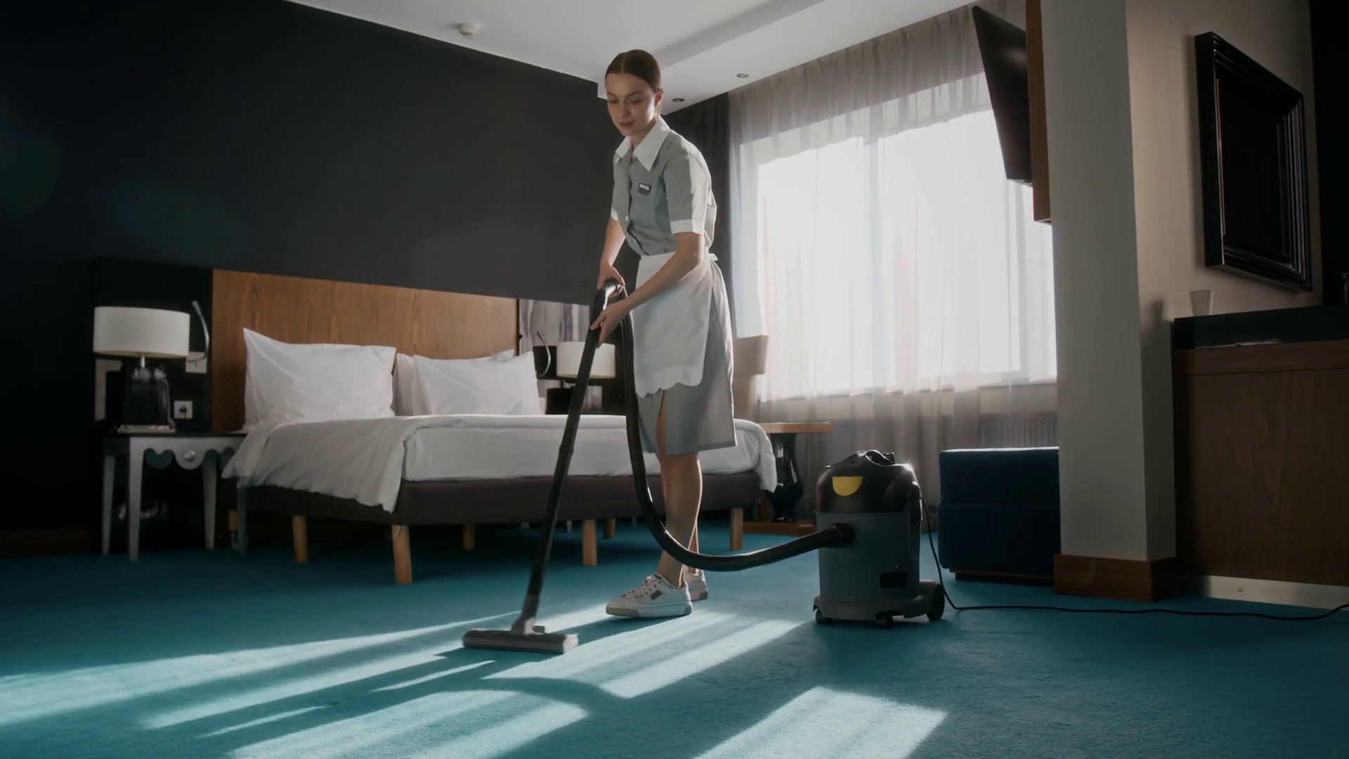 Female Hotel Housekeeper In Uniform Cleaning Stock Footage SBV-352020416 - Storyblocks