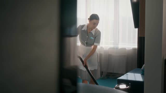 Woman Cleaning Office Stock Footage: Royalty-Free Video Clips - Storyblocks