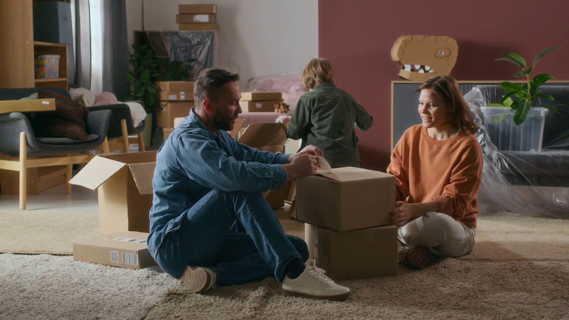 Family Unpacking Toys From Boxes Amidst Stock Footage SBV-352890181 ...