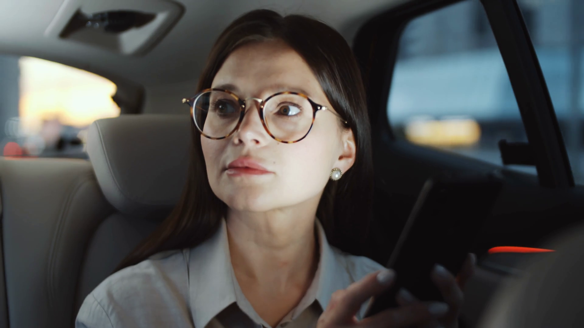 Young Woman Riding In Backseat Of Car Typing Stock Footage SBV-347176614 - Storyblocks