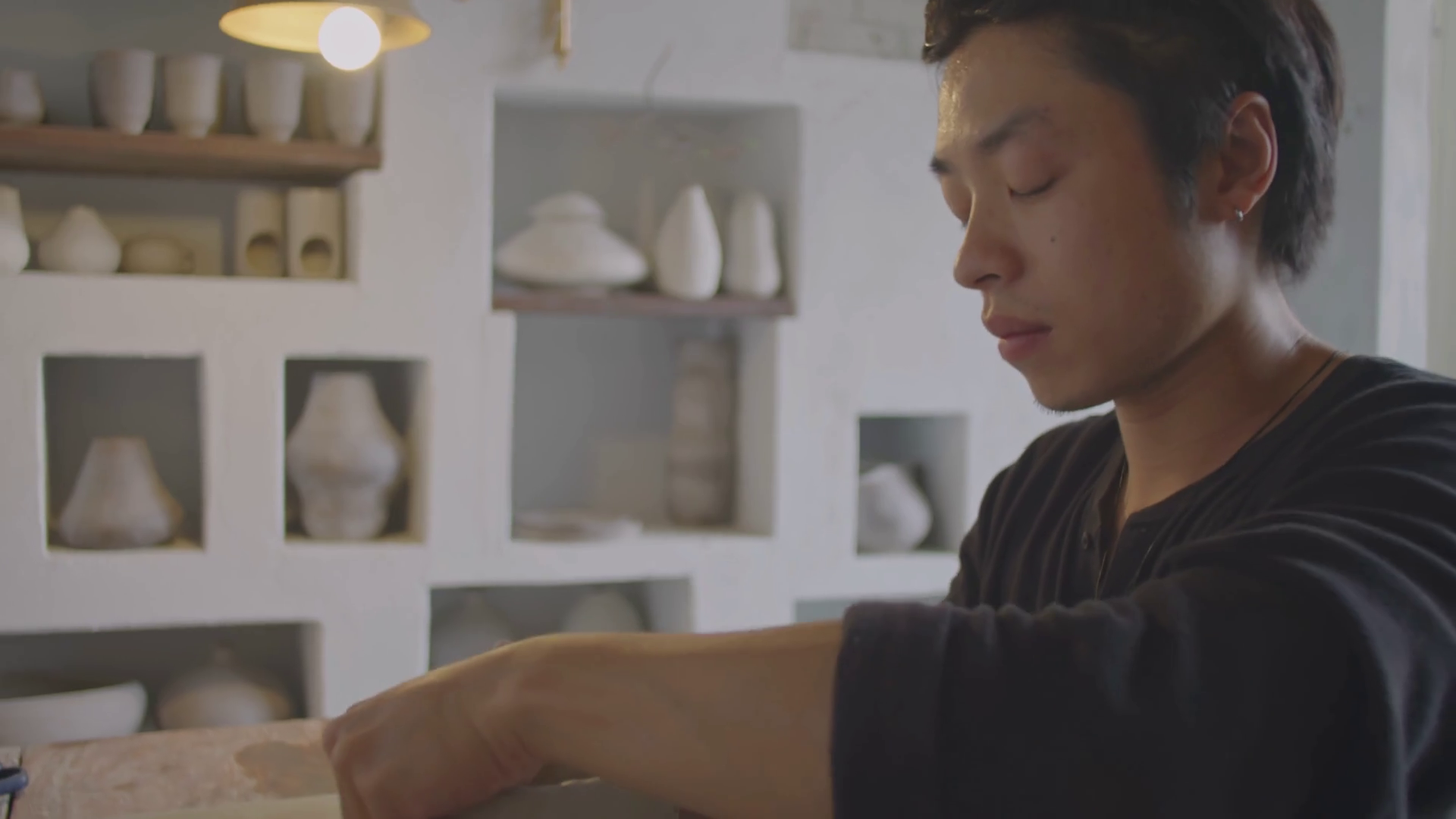 Tilt Down Shot Of Young Asian Potter Forming Stock Footage SBV ...