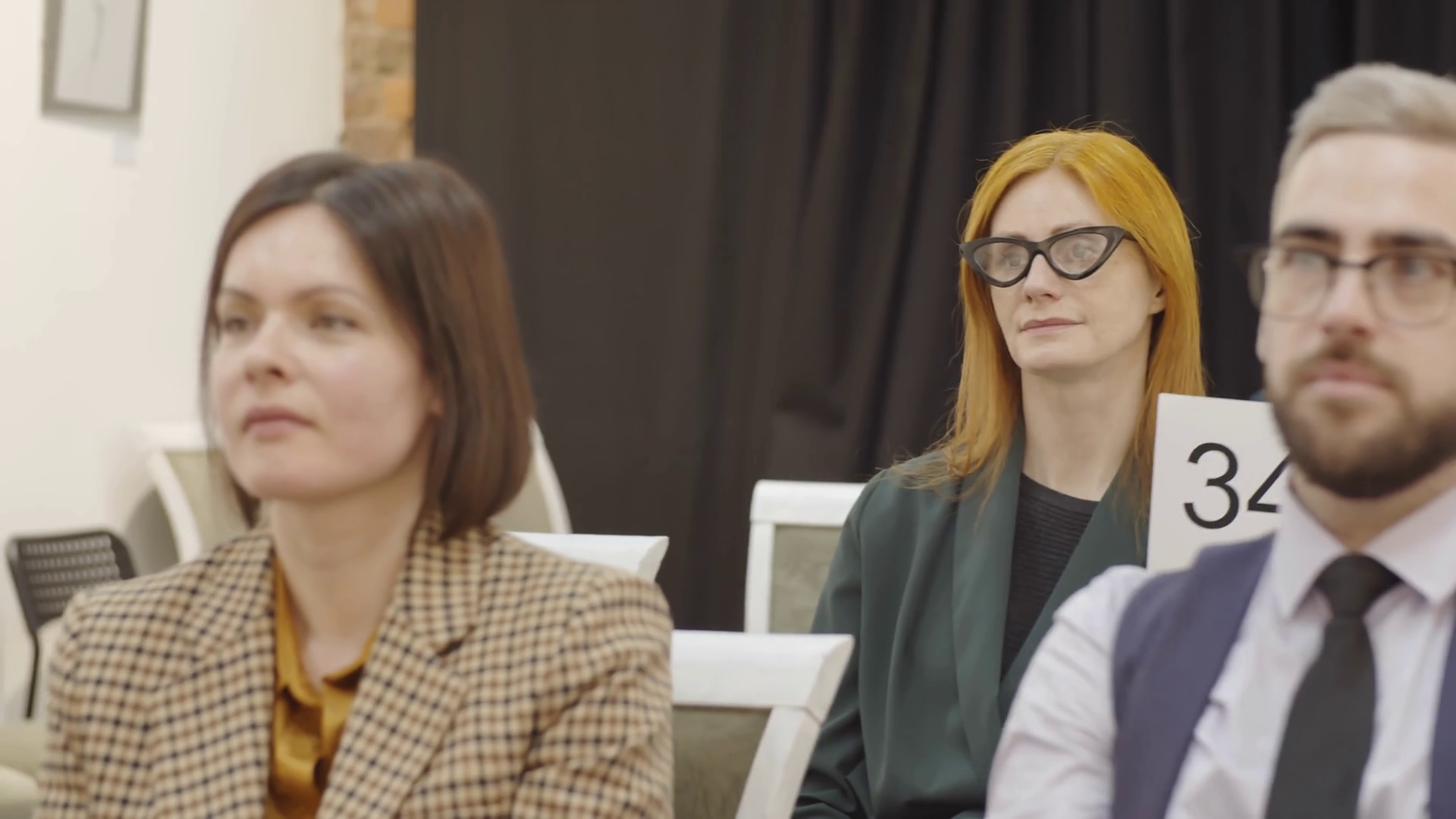 Group Of Men Women Sitting In Auction House Stock Footage SBV-347030257 ...
