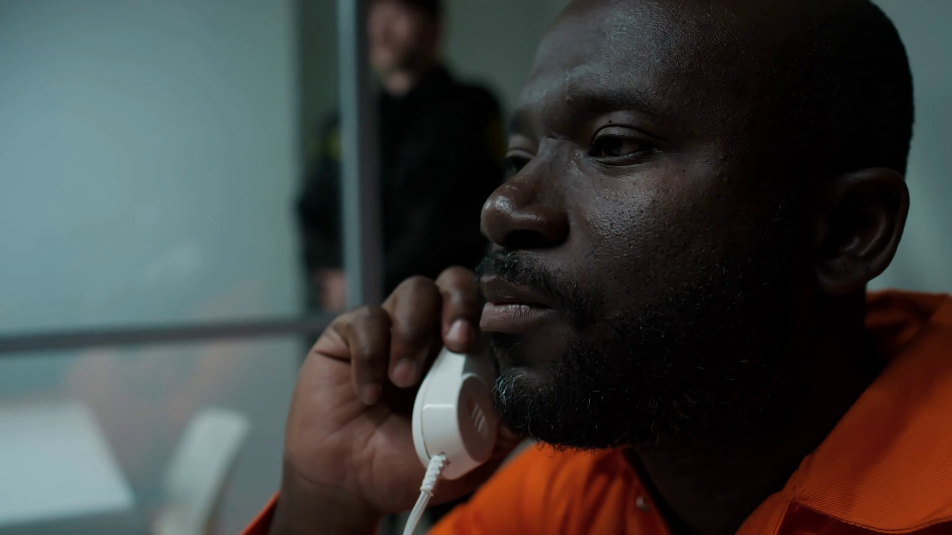 African American Inmate Talking On Phone In Stock Footage SBV-348820222 ...
