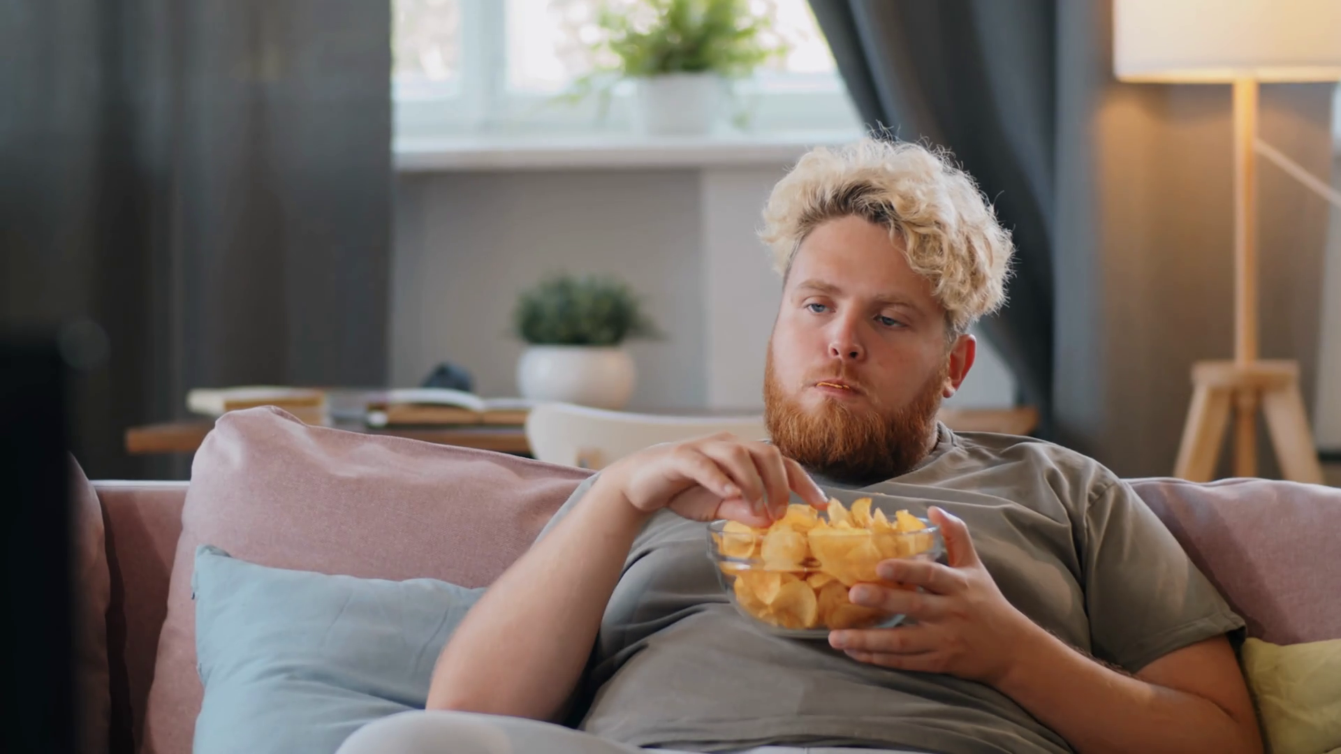 Young Man Enjoying Snacks Tv At Home Stock Footage SBV-347619185 ...