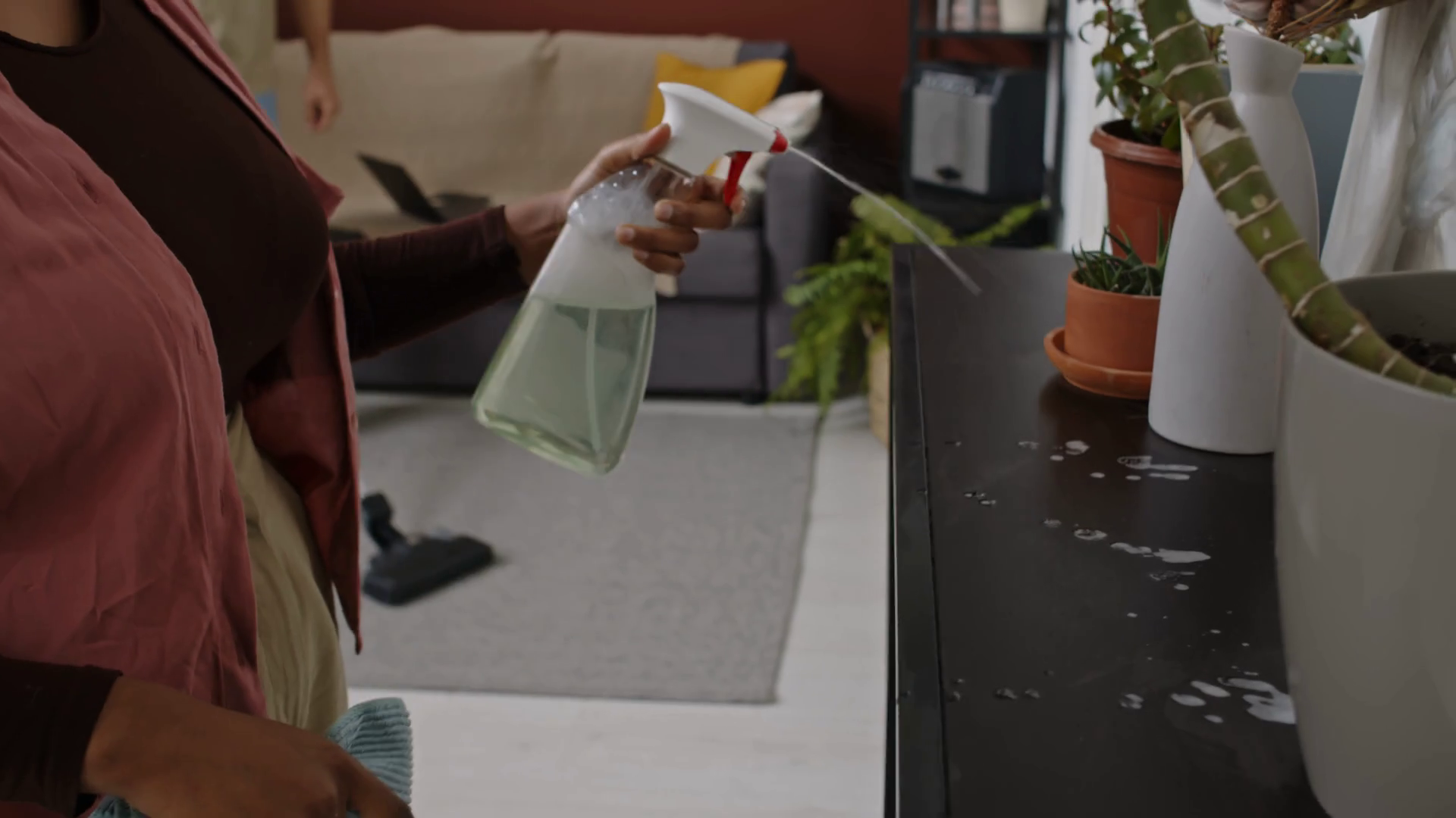 Tilt Shot Of Young Biracial Woman Spraying Stock Footage SBV-348727431 - Storyblocks