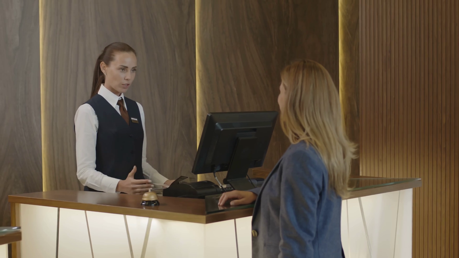 Young Female Receptionist Welcoming Woman Stock Footage SBV-348777380 ...