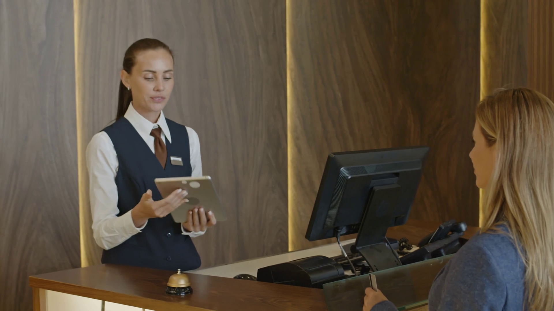 Female Receptionist Giving Digital Tablet To Stock Footage SBV ...
