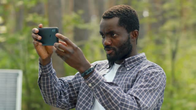 Black Man Camera Stock Footage: Royalty-Free Video Clips - Storyblocks