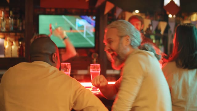People Watching Tv In Bar Stock Footage: Royalty-Free Video Clips ...