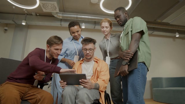 People Around A Computer Stock Footage: Royalty-Free Video Clips ...