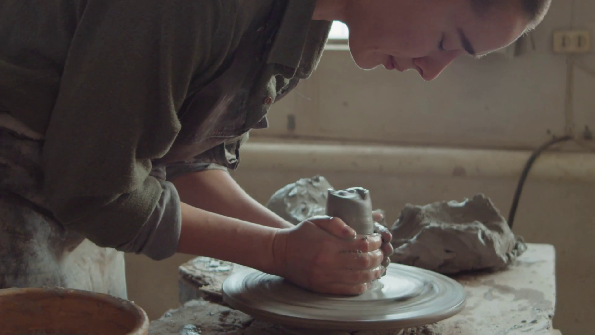 Tilt Up Shot Of Young Woman Coning Up Clay Stock Footage SBV-346747650 ...