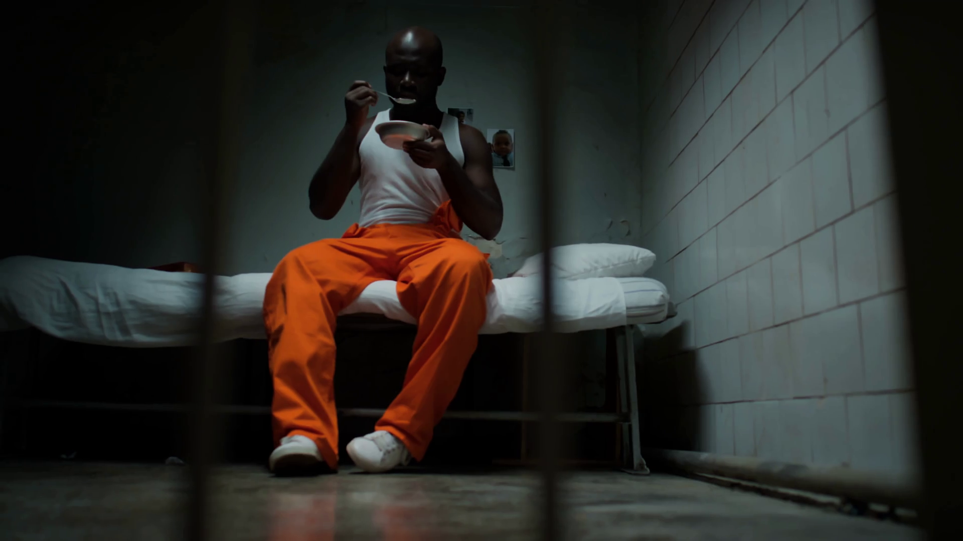 View Through Cell Bars Of Black Inmate Stock Footage SBV-348821200 ...