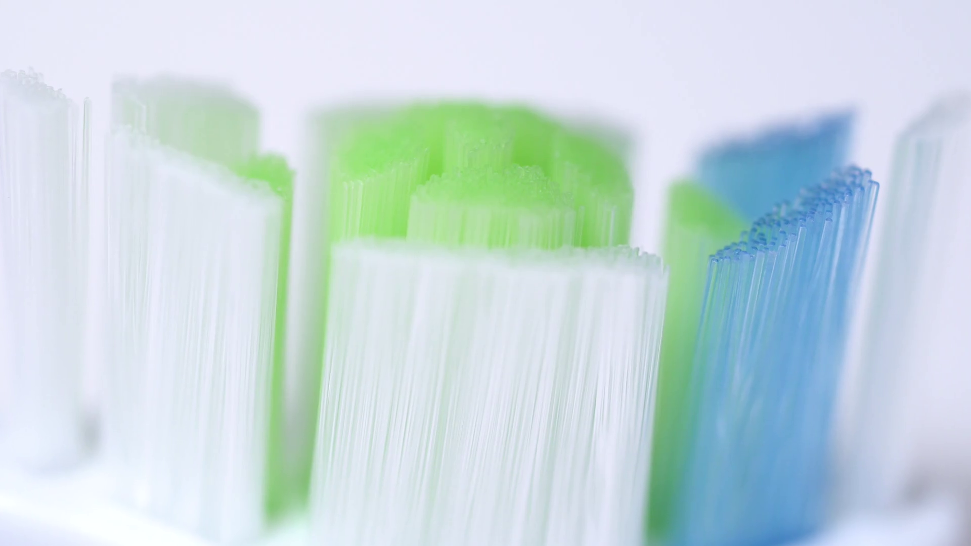 Macro detail of a toothbrush with gradual focused zoom-in Stock Video ...