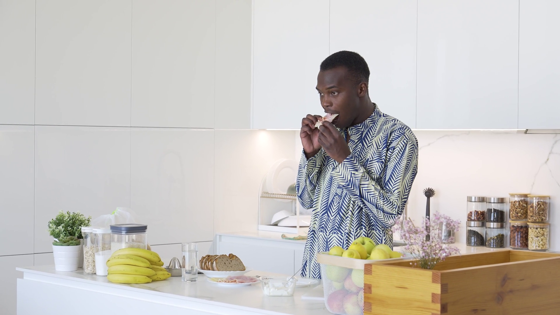 A Black Man Takes Bite Off Slice Of Bread Stock Footage SBV-347727149 ...