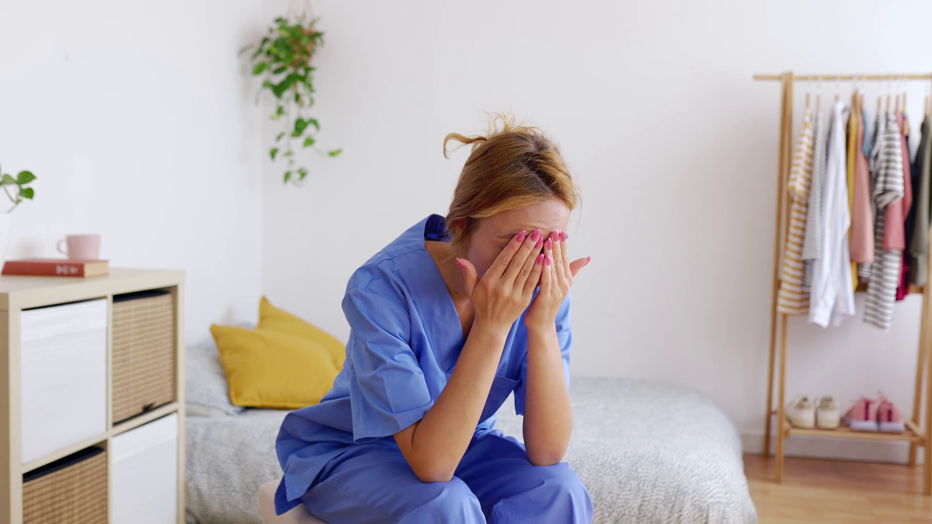 Young Female Nurse Feeling Overwhelmed At Stock Footage SBV-352917141 ...