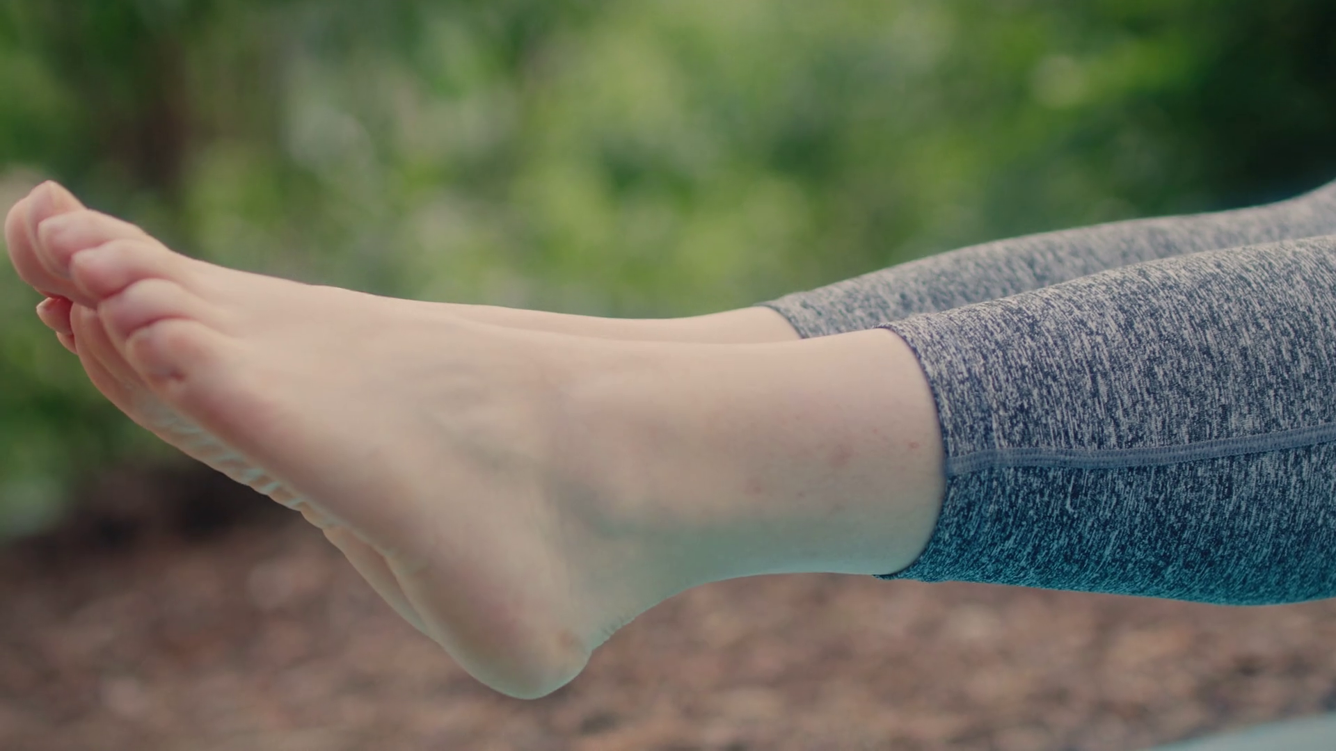 Girl Practices Yoga Feet In Air Detail Stock Footage SBV-347772464 ...