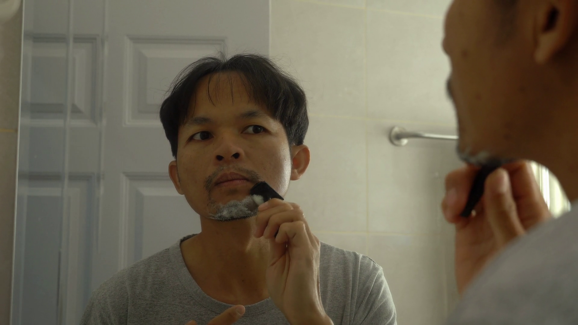 Asian Man Shaving Beard On Face In Bath Room Stock Footage SBV ...