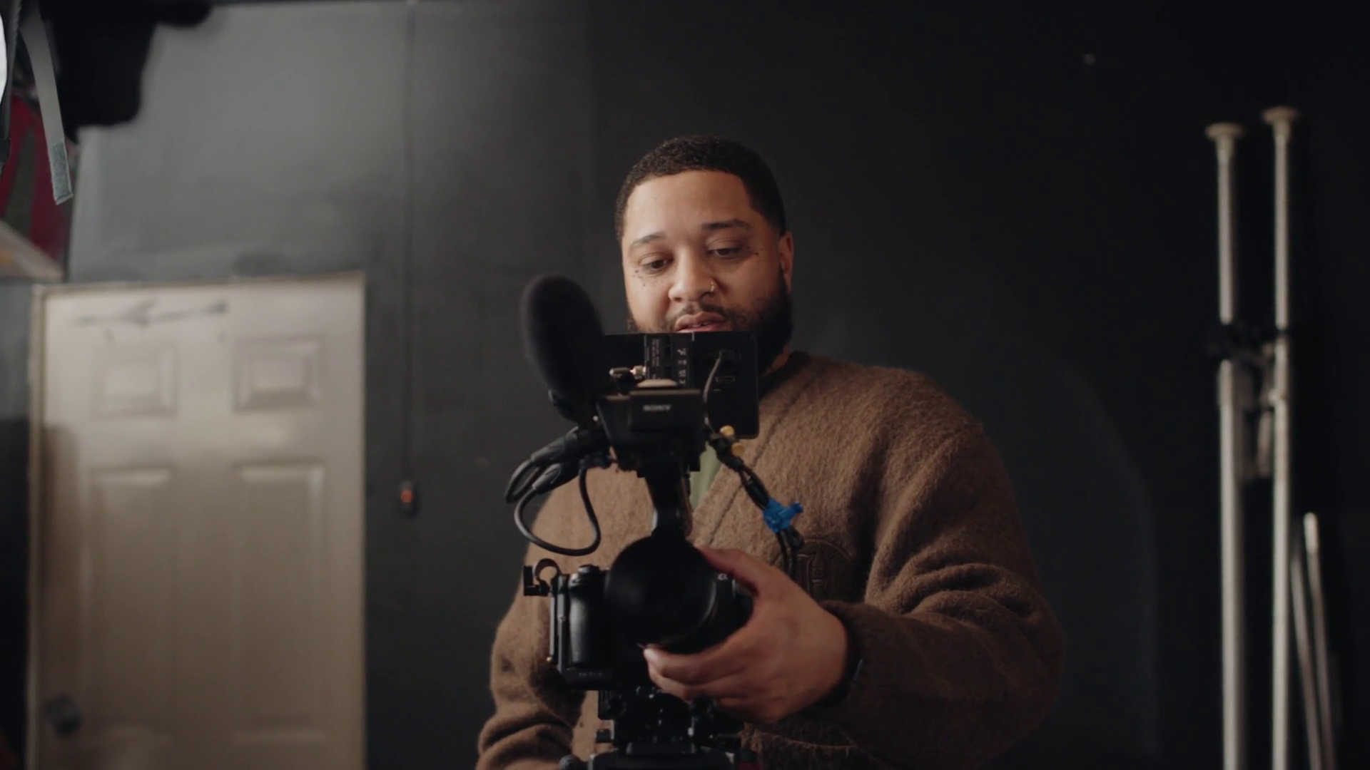 Handheld Shot Of Cameraman Setting Up Camera Stock Footage SBV ...