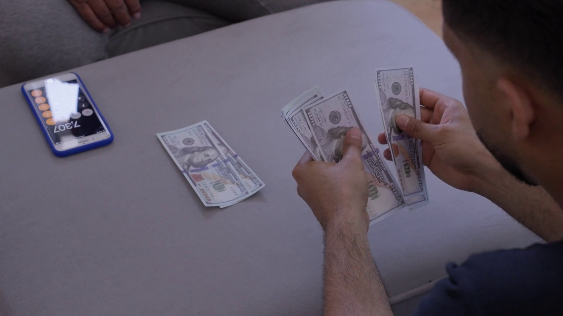 Over Shoulder Shot Of Two Men Counting Stock Footage SBV-352561454 ...