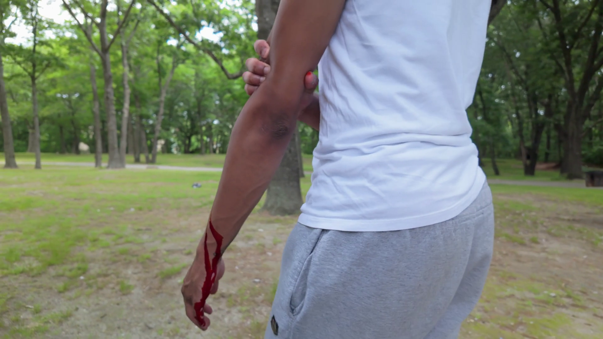 Handheld Shot Of Man Holding Bleeding Arm Stock Footage SBV-352725073 ...