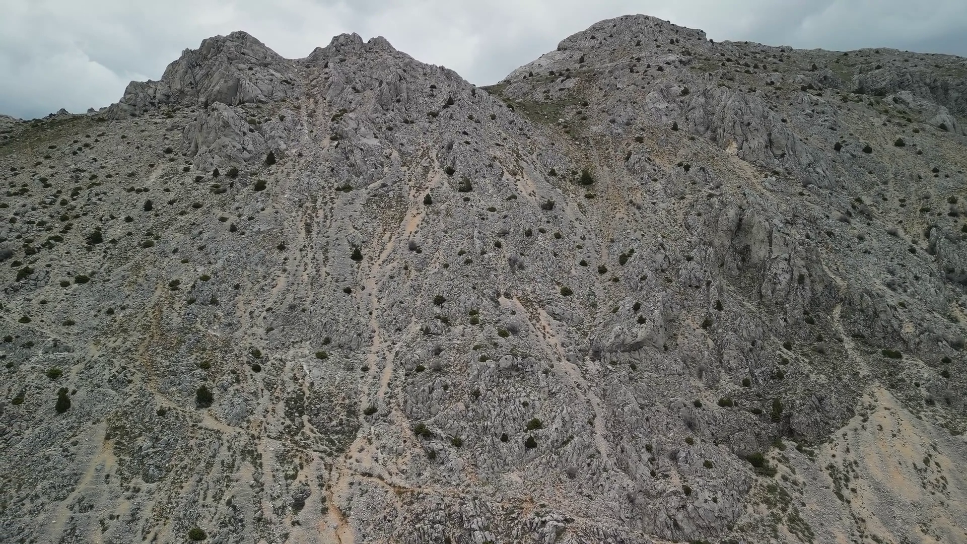 Side Aerial Shot Of Steep Rocky Slopes Near Stock Footage SBV-352073685 ...