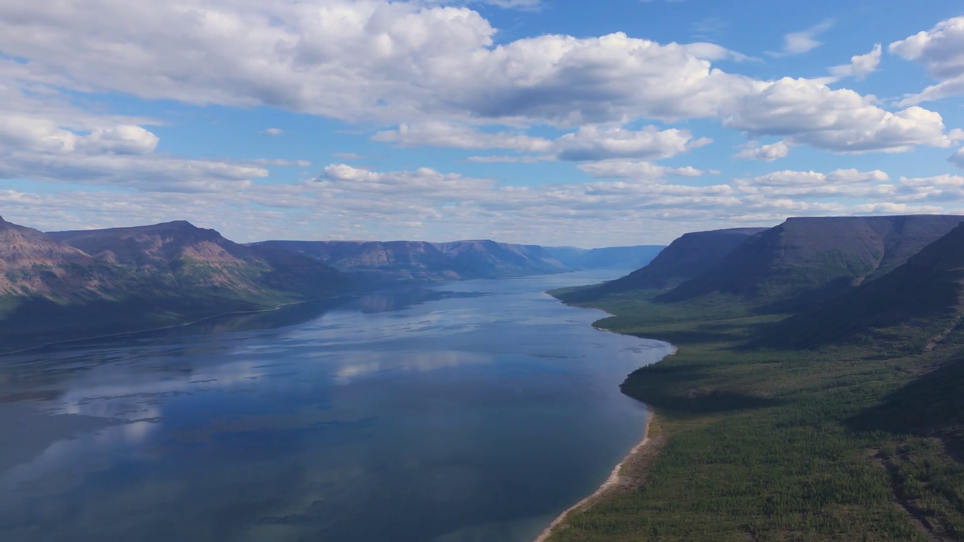Aerial View Along Lake Lama Water Meets Stock Footage SBV-352843082 ...