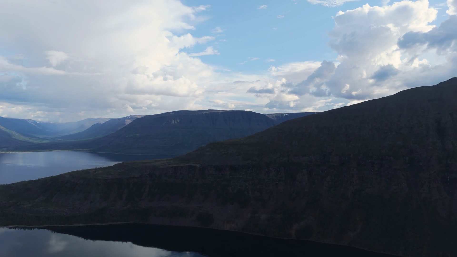 Aerial View Of Rugged Ridge Above Lake Lama Stock Footage SBV-352939228 ...