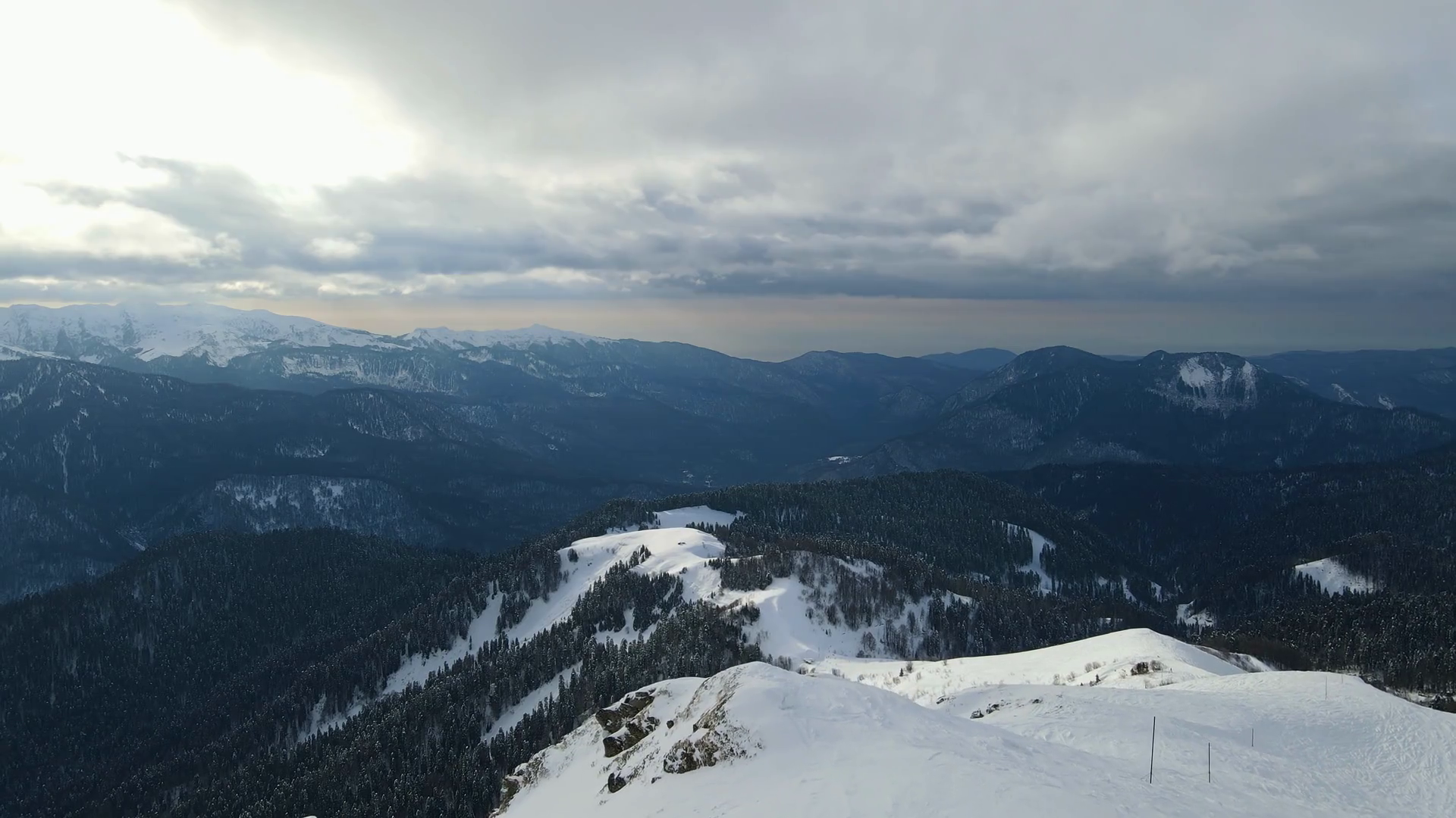 Aerial view of the southern slope of the Aibga ridge with a ski lift ...