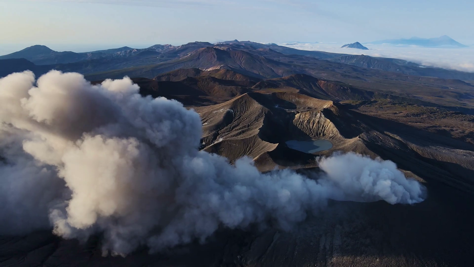 Aerial View Of Eruption Of Ash Clouds Ebeko Stock Footage SBV-348768722 ...