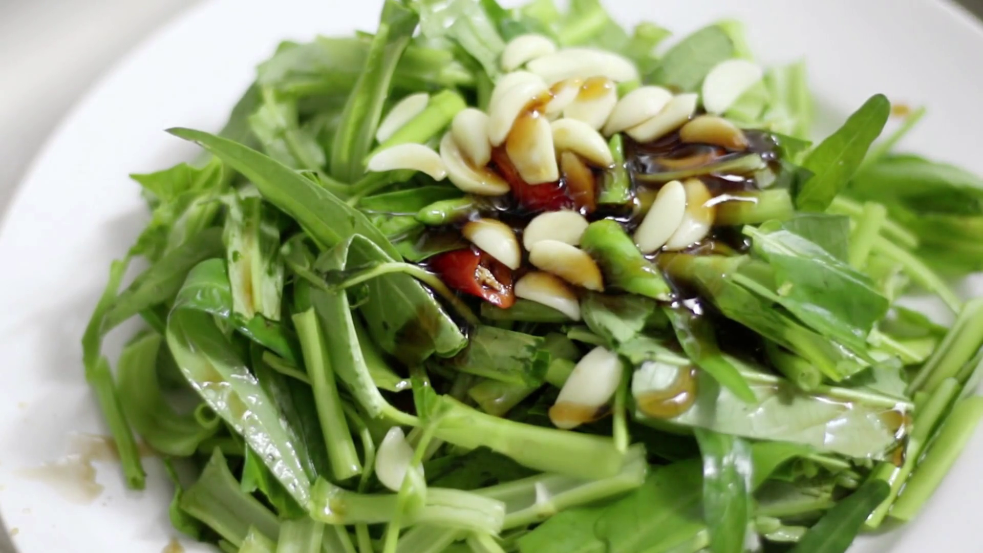 Fresh Water Spinach Salad With Garlic Sauce Stock Footage SBV-353113463 ...