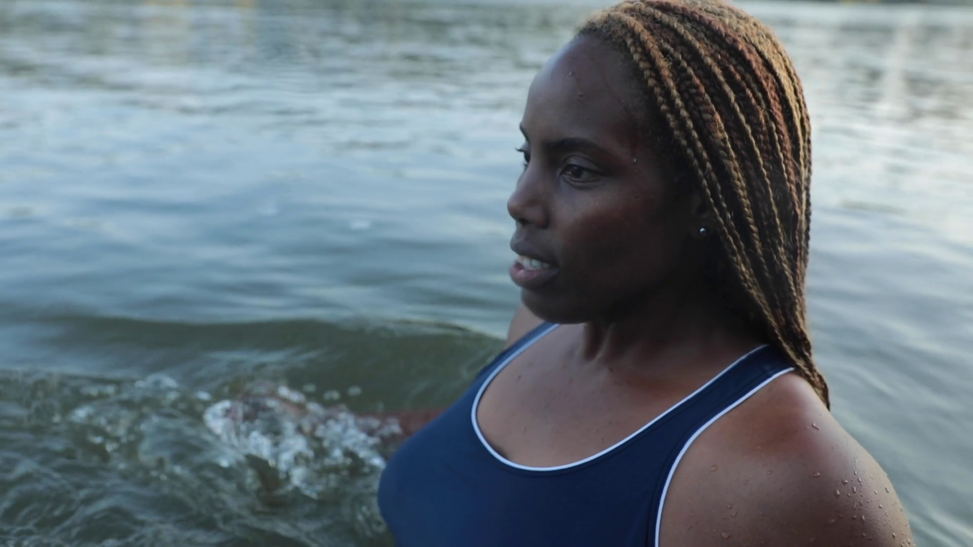 A Black Woman Moves Partially Underwater Stock Footage SBV-338646452 ...