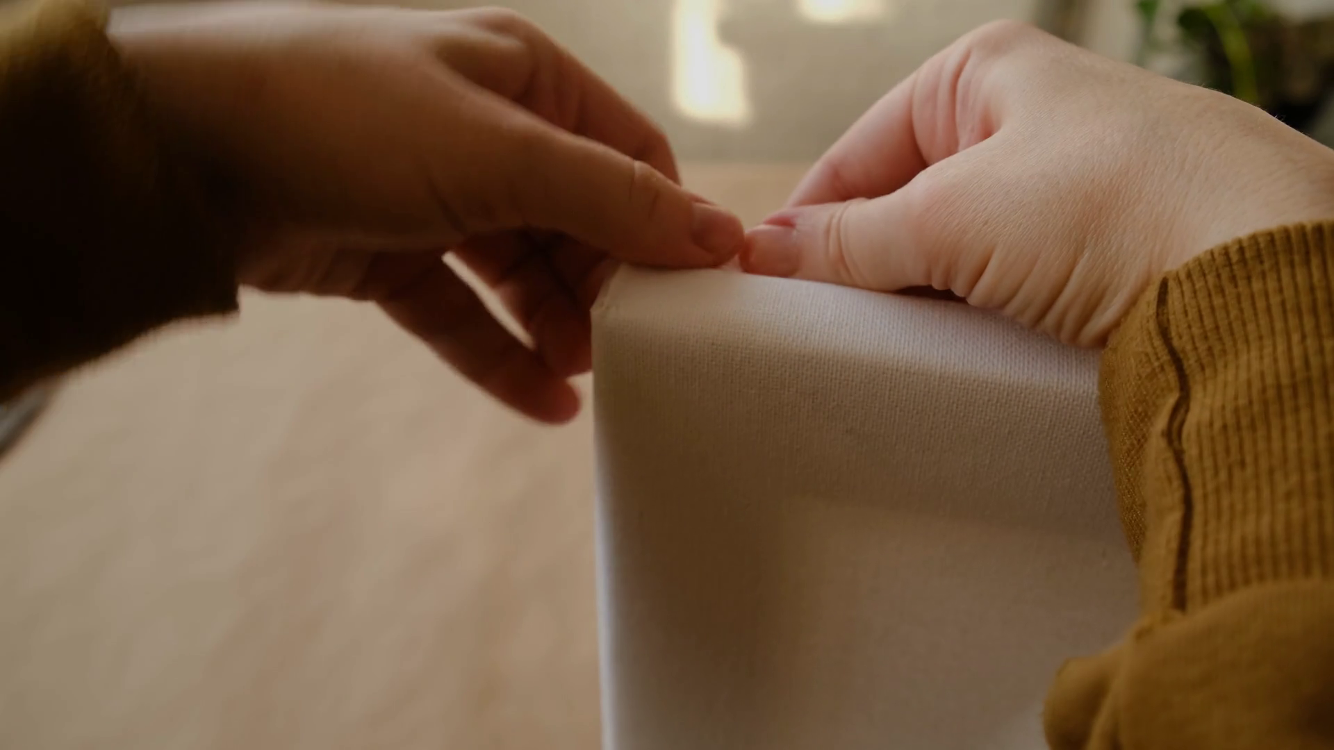 Female Hands Bend Corners Of Canvas Stock Footage SBV-351808874 ...