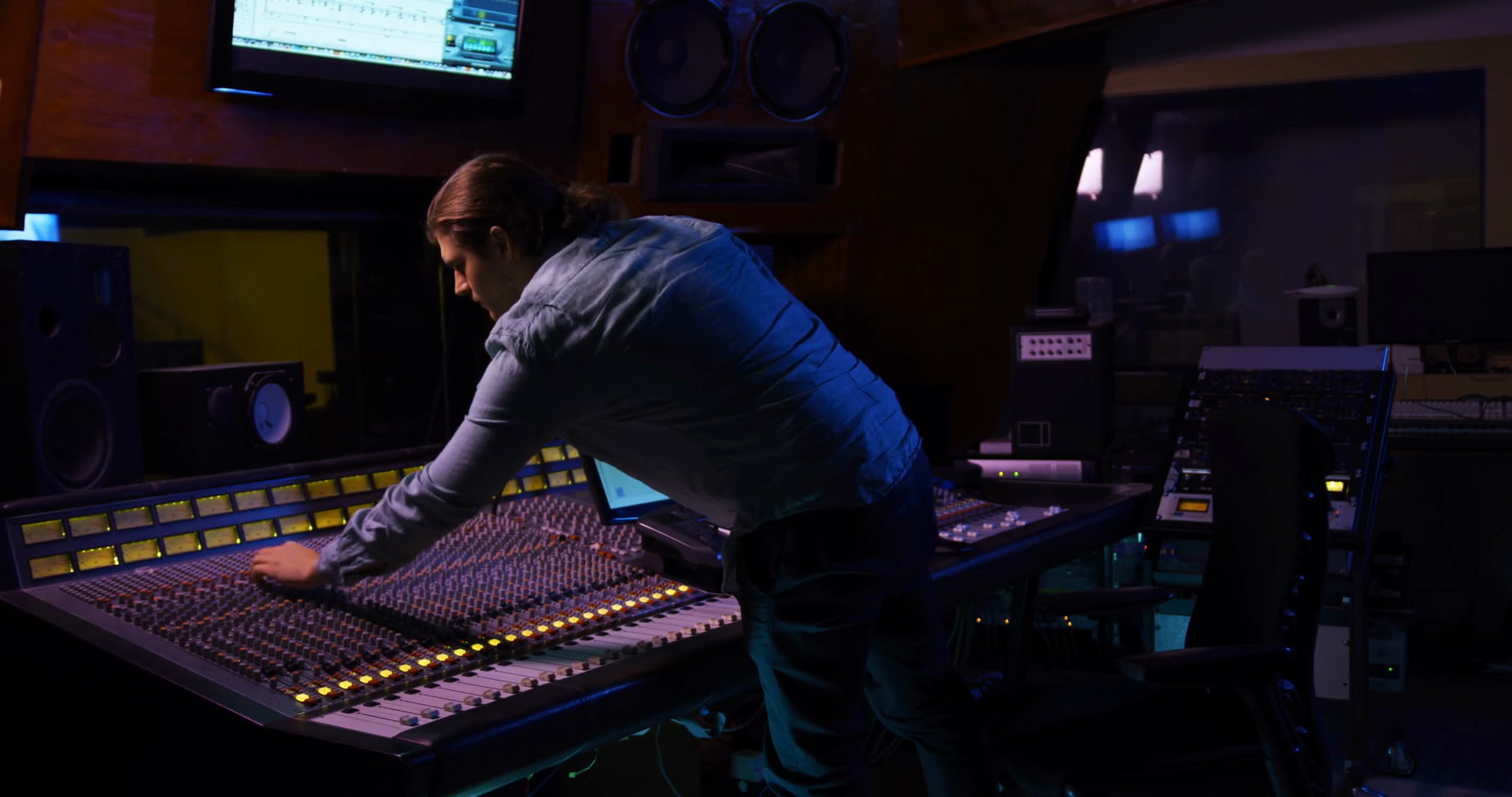 Male Sound Engineer Working At Mixing Desk Stock Footage SBV-346590043 ...