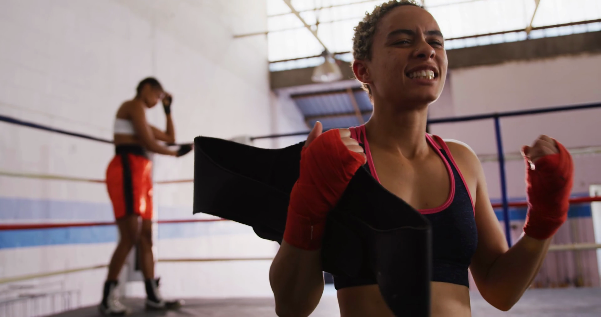 Mixed Race Woman Happy To Win In Boxing Gym Stock Footage SBV-346590332 ...