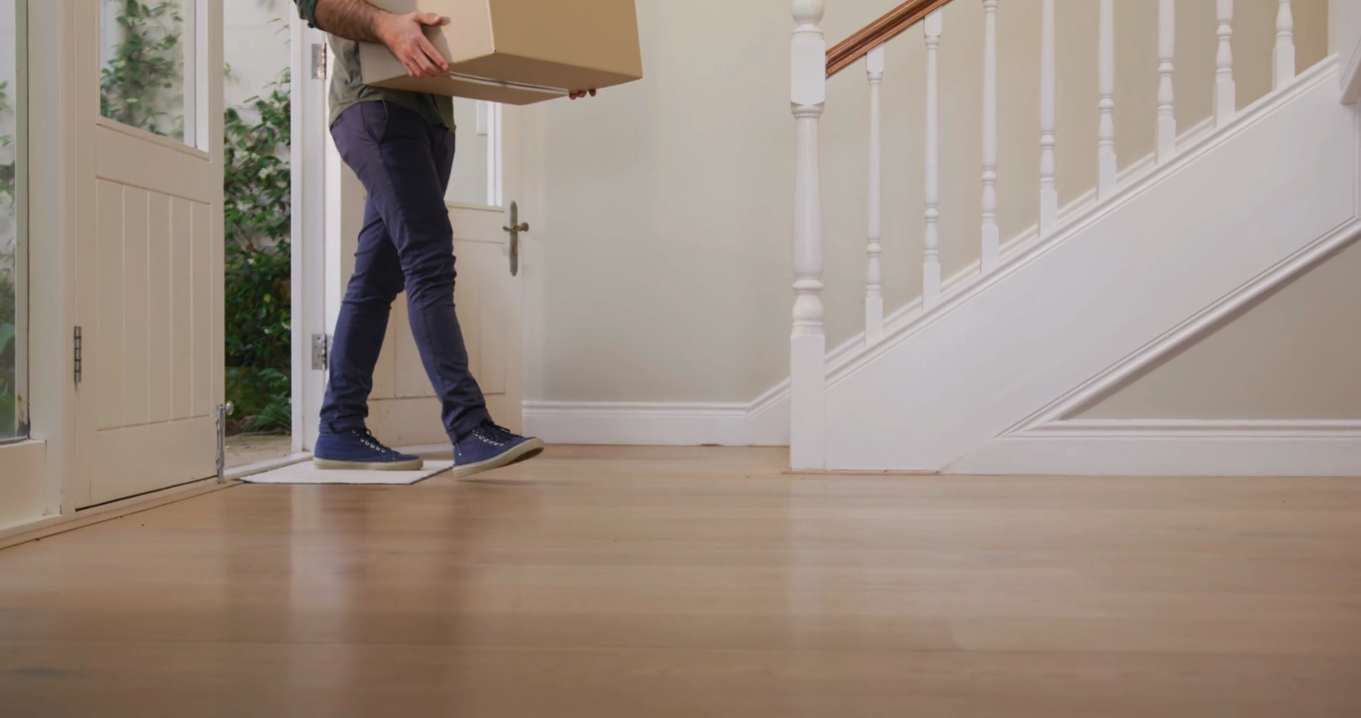 Caucasian attractive man moving into new house Stock Video Footage 00: ...